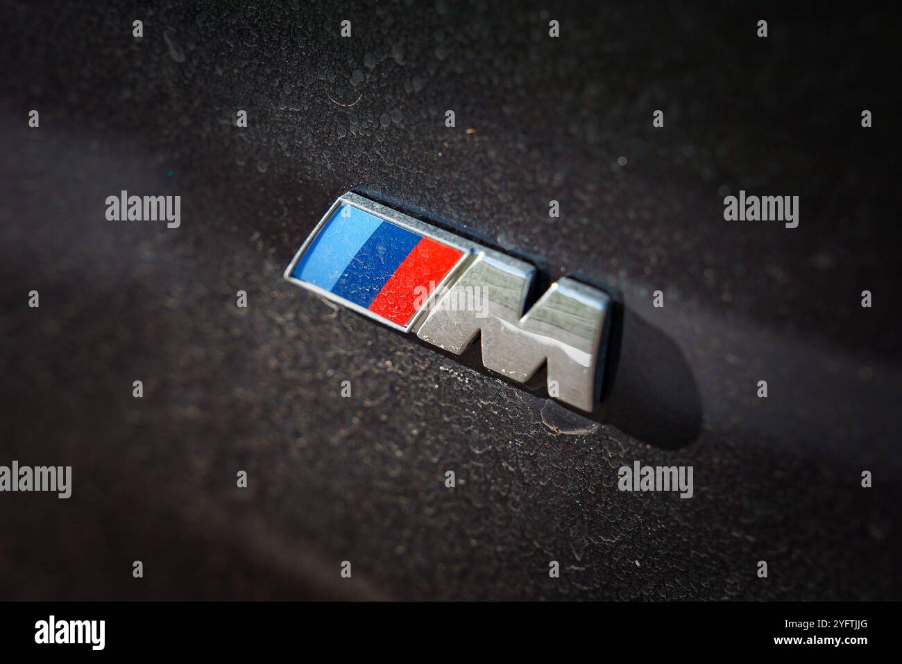 Close Up of BMW M Badge on Dark Vehicle Surface Stock Photo - Alamy