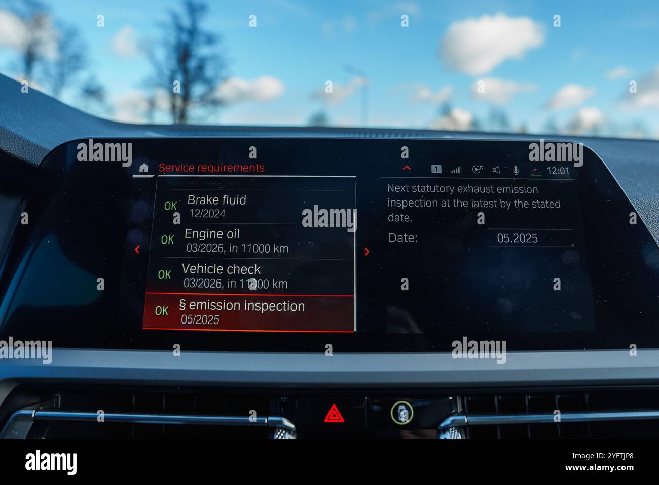 The dashboard of a BMW shows service requirements on a digital screen ...