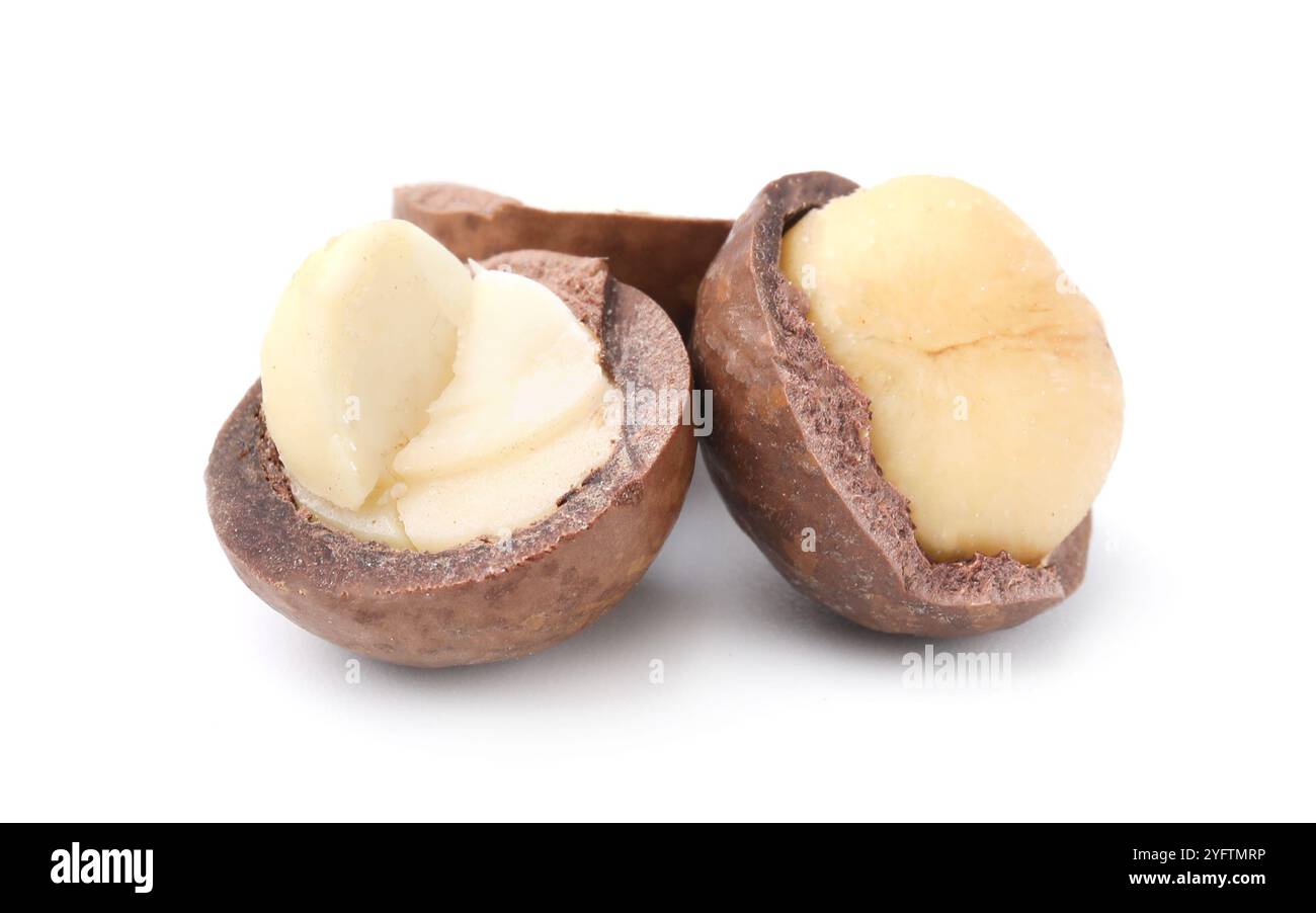 Macadamia nuts with shells isolated on white Stock Photo - Alamy