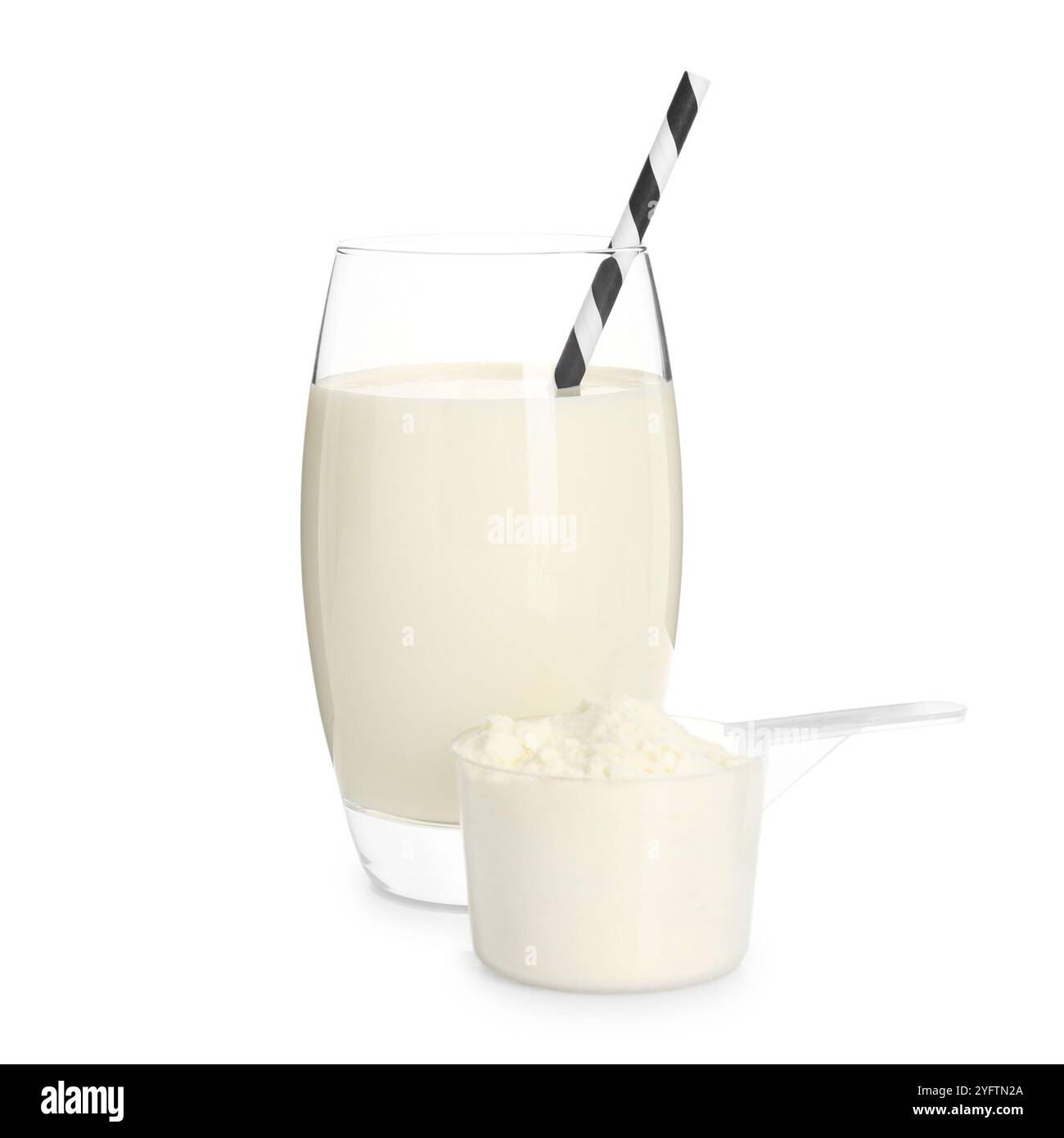 Delicious protein shake in glass and scoop with powder isolated on ...