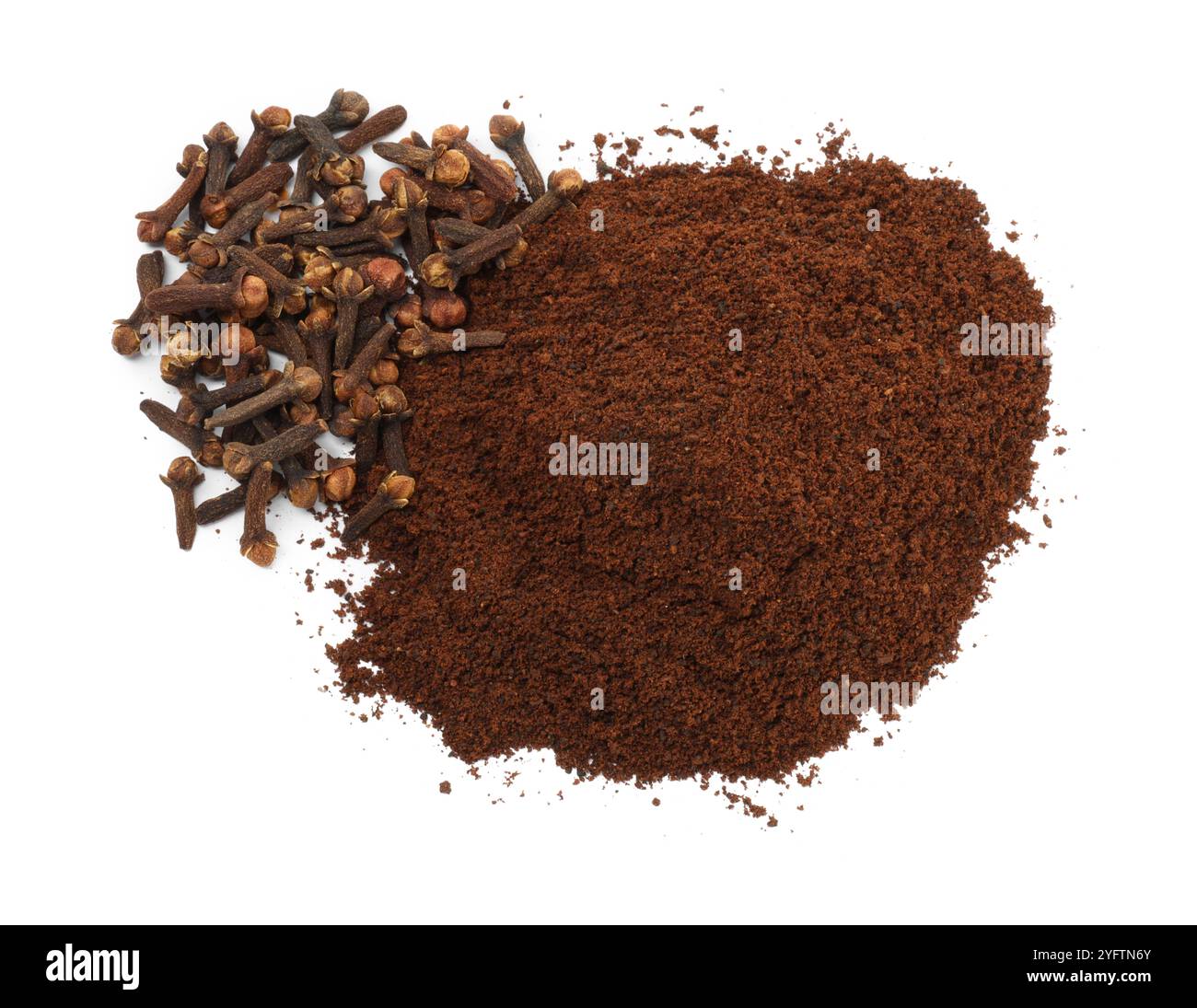 Pile of clove powder and dried buds on white background, top view ...