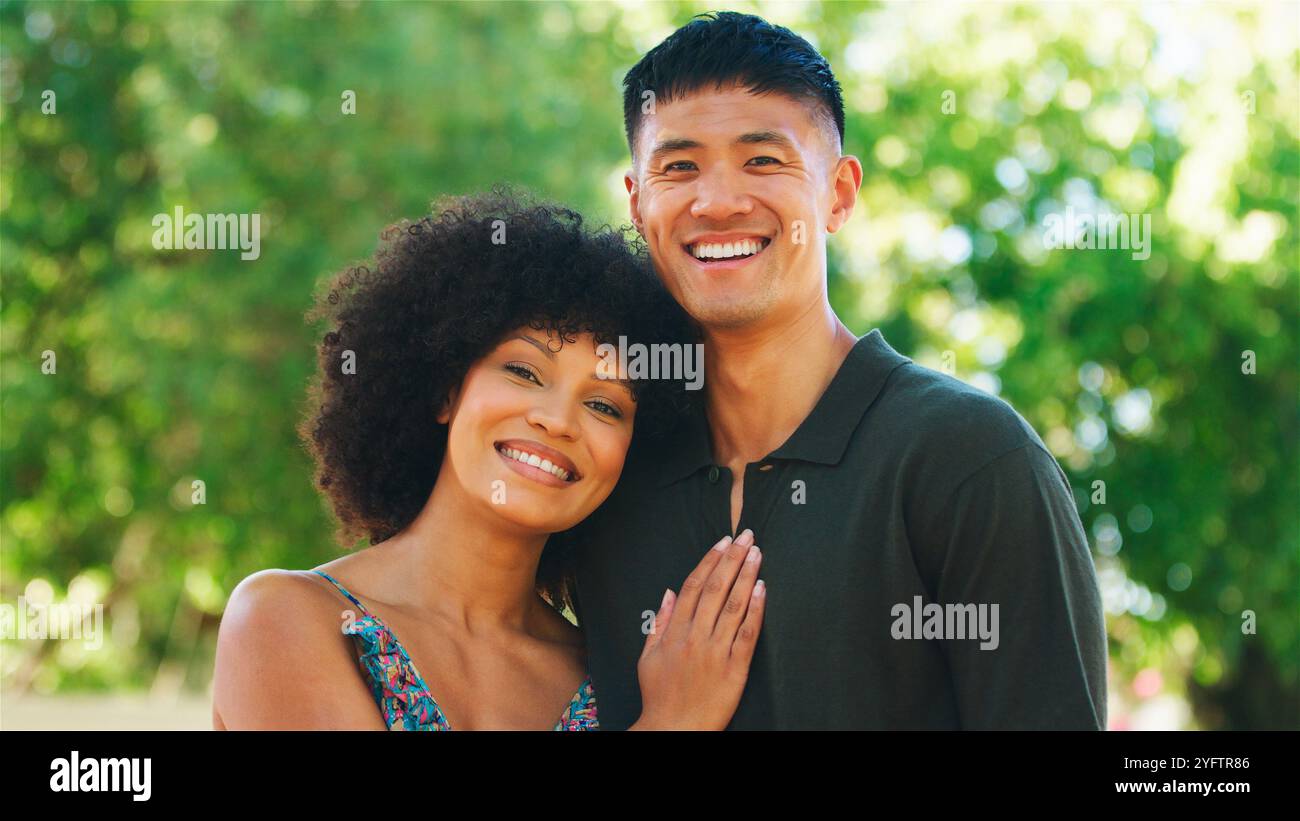 Joyful young couple embraces hi-res stock photography and images - Alamy