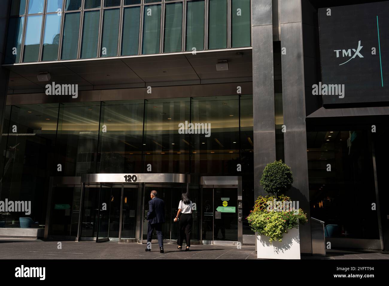 Toronto, Canada. 09th Sep, 2024. People walk by the TMX Market Centre ...