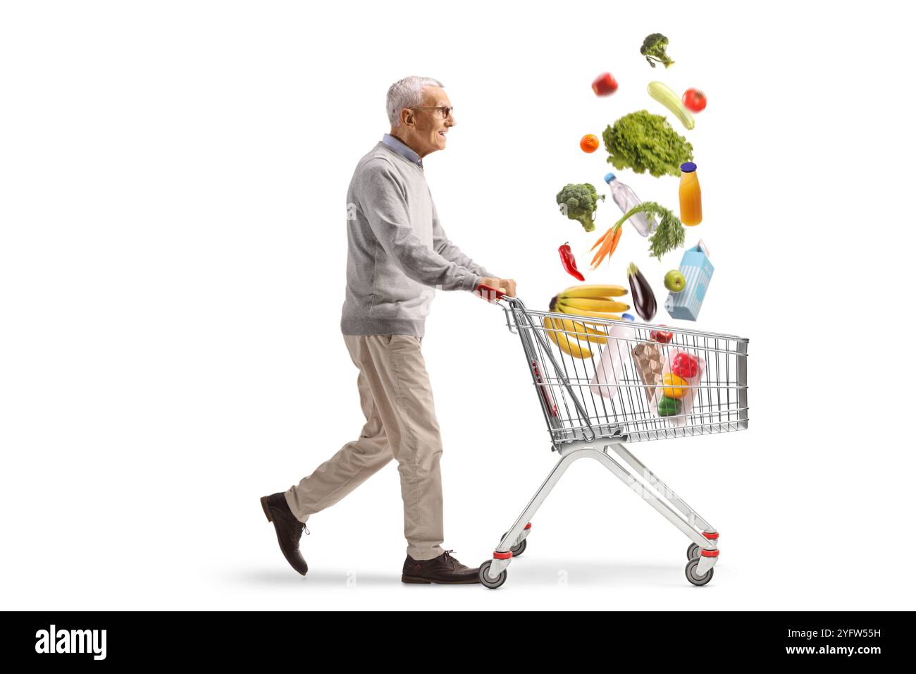 Full length profile shot of an elderly man walking and pushing a ...