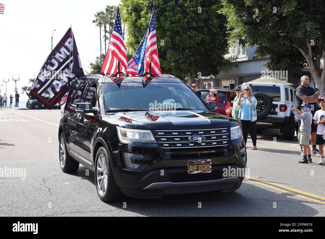 November 2, 2024, Seal Beach, California, USA: Supporters in their ...
