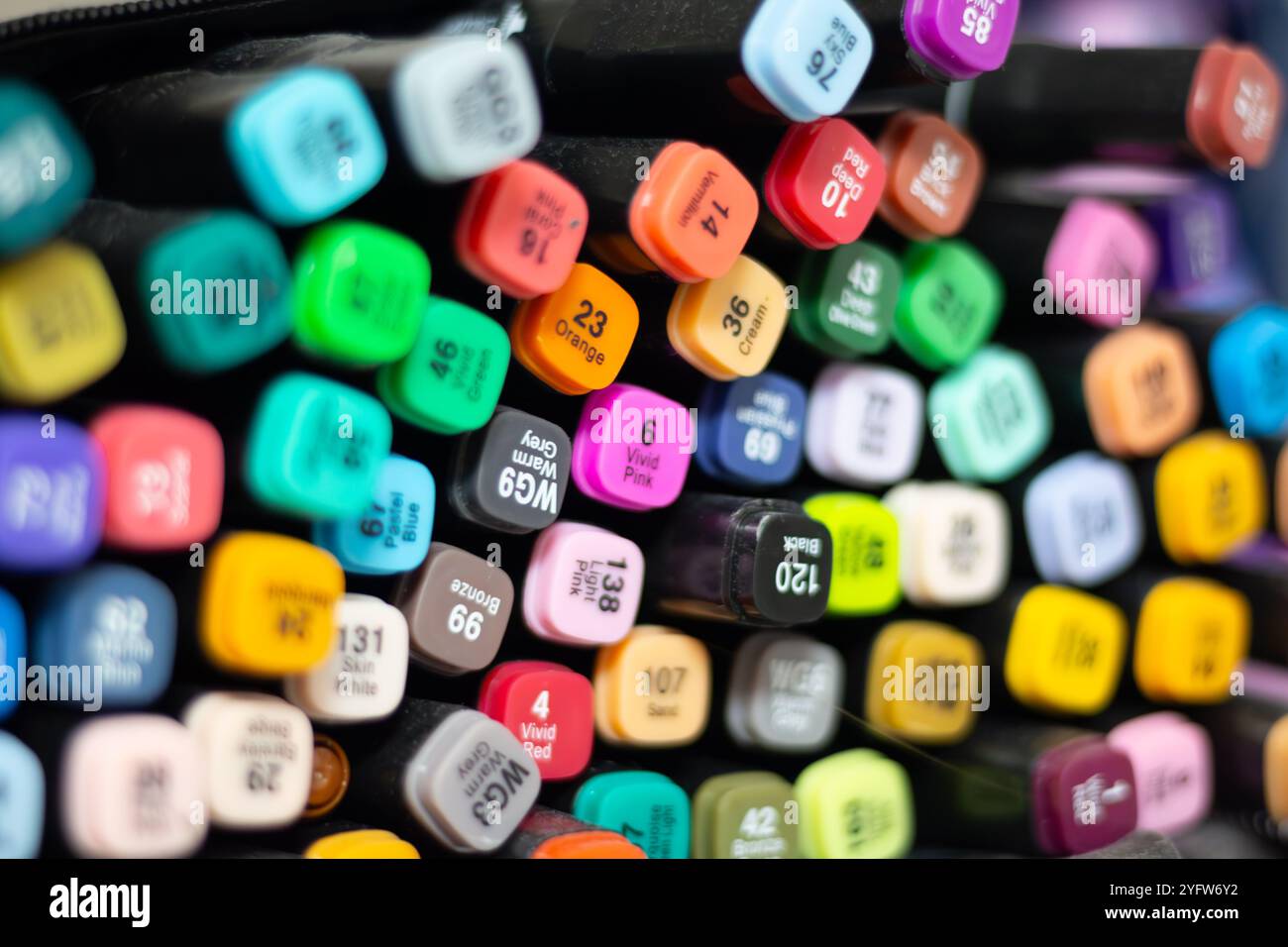A vibrant collection of colorful markers arranged neatly, perfect for ...