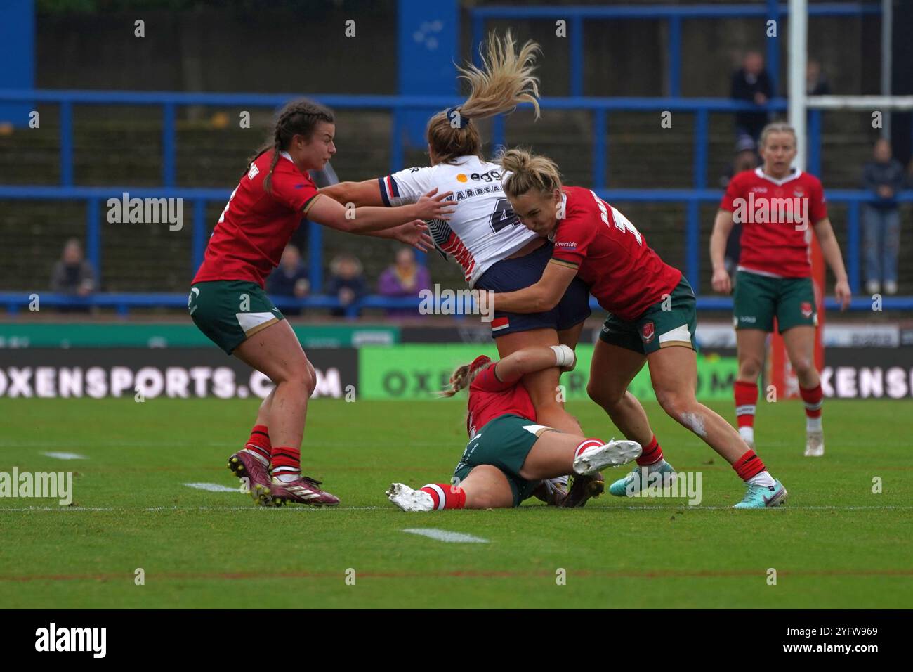 Carys Marsh (L) Hannah Jones (C) and Bethan Dainton (R) tackle Amy ...