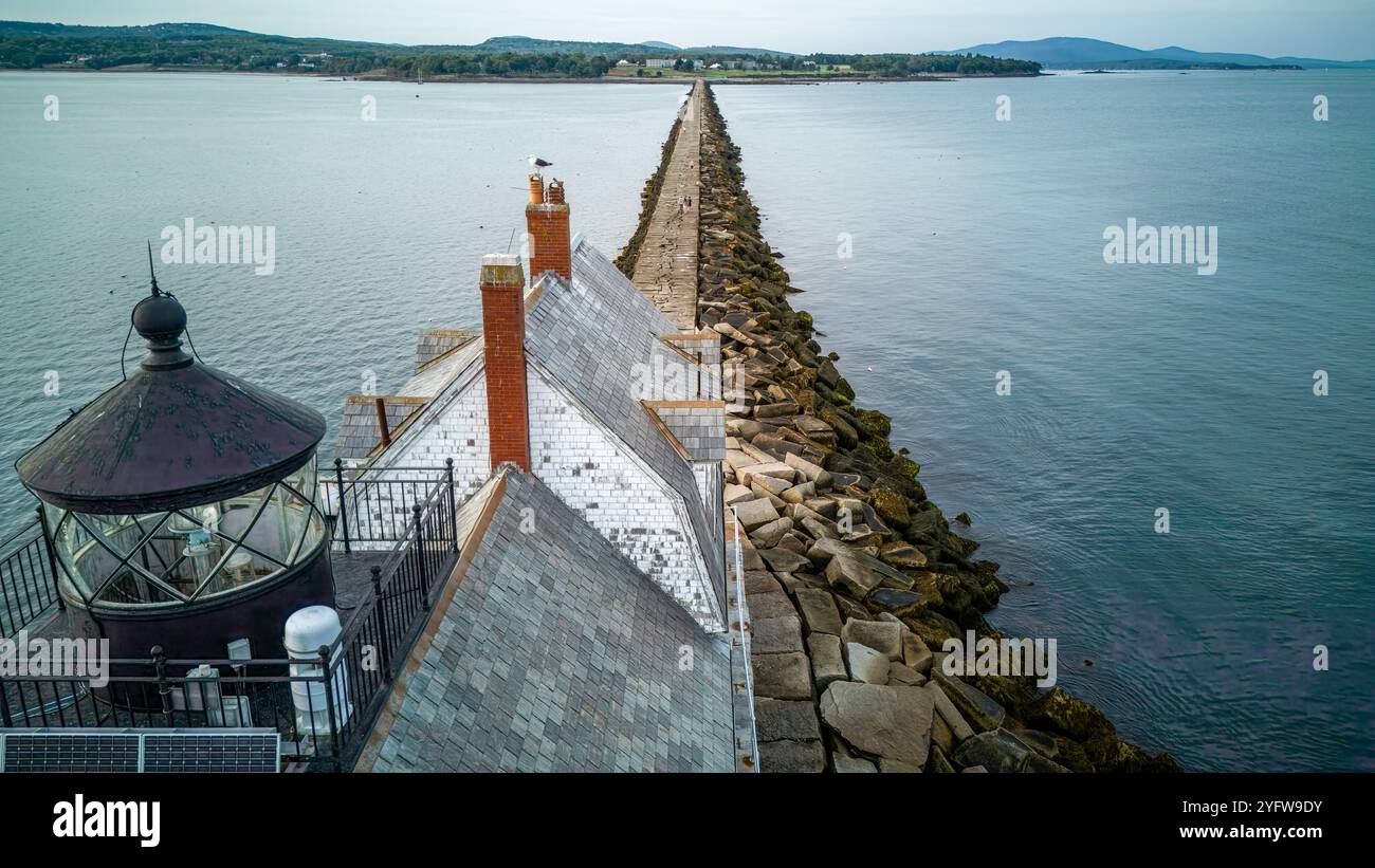 Rockland Breakwater Lighthouse cutting through the harbor on the Gulf ...