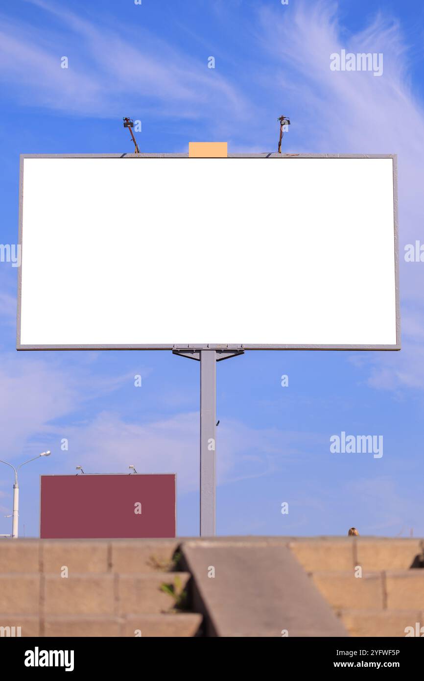 Background for design, white billboards on city streets and along roads ...