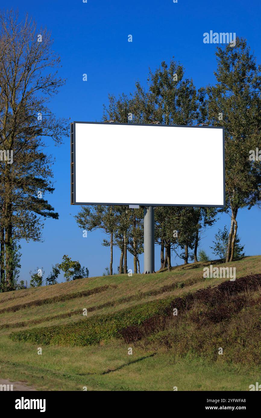 Background for design, white billboards on city streets and along roads ...
