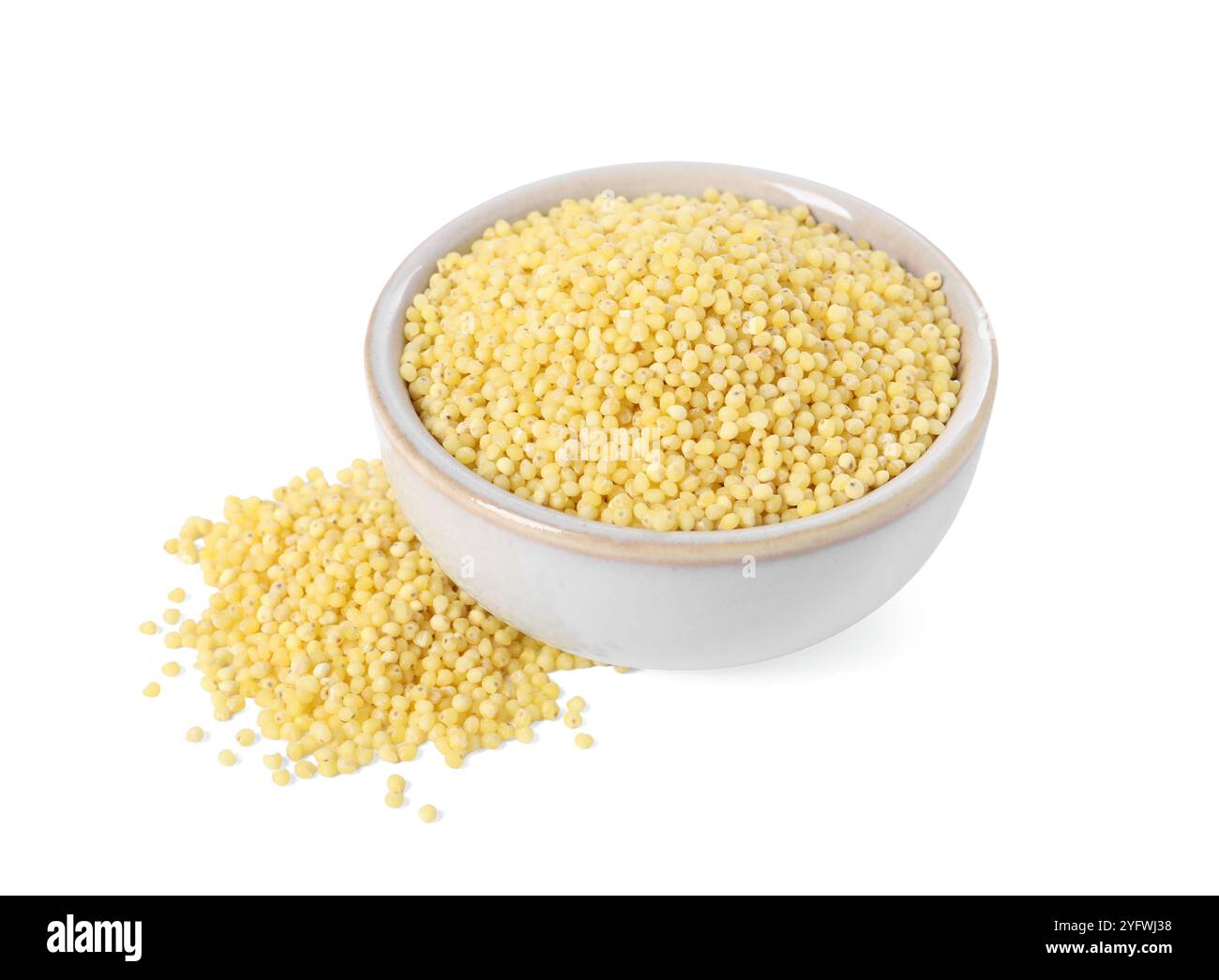 Millet groats in bowl isolated on white Stock Photo - Alamy