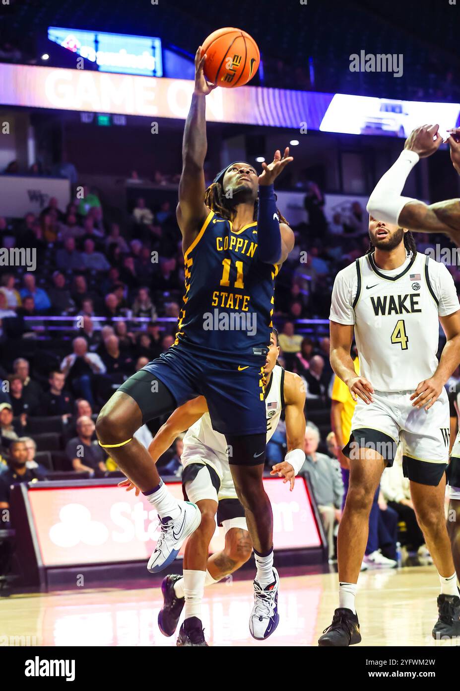 November 4, 2024: Coppin State guard Derrius Ward (11) goes up for ...