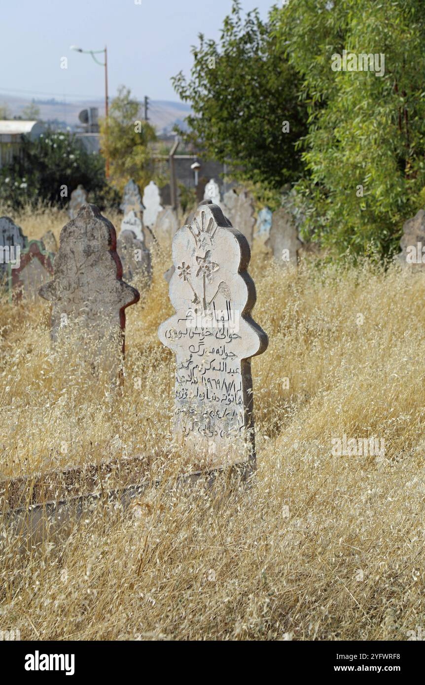 Graves in the public cemetery at Halabja in Iraqi Kurdistan Stock Photo ...