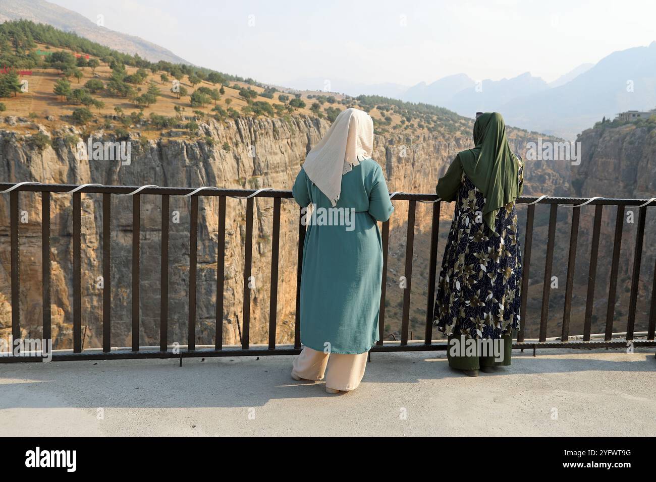 Tourists at a viewpoint in Iraqi Kurdistan overlooking the famous ...