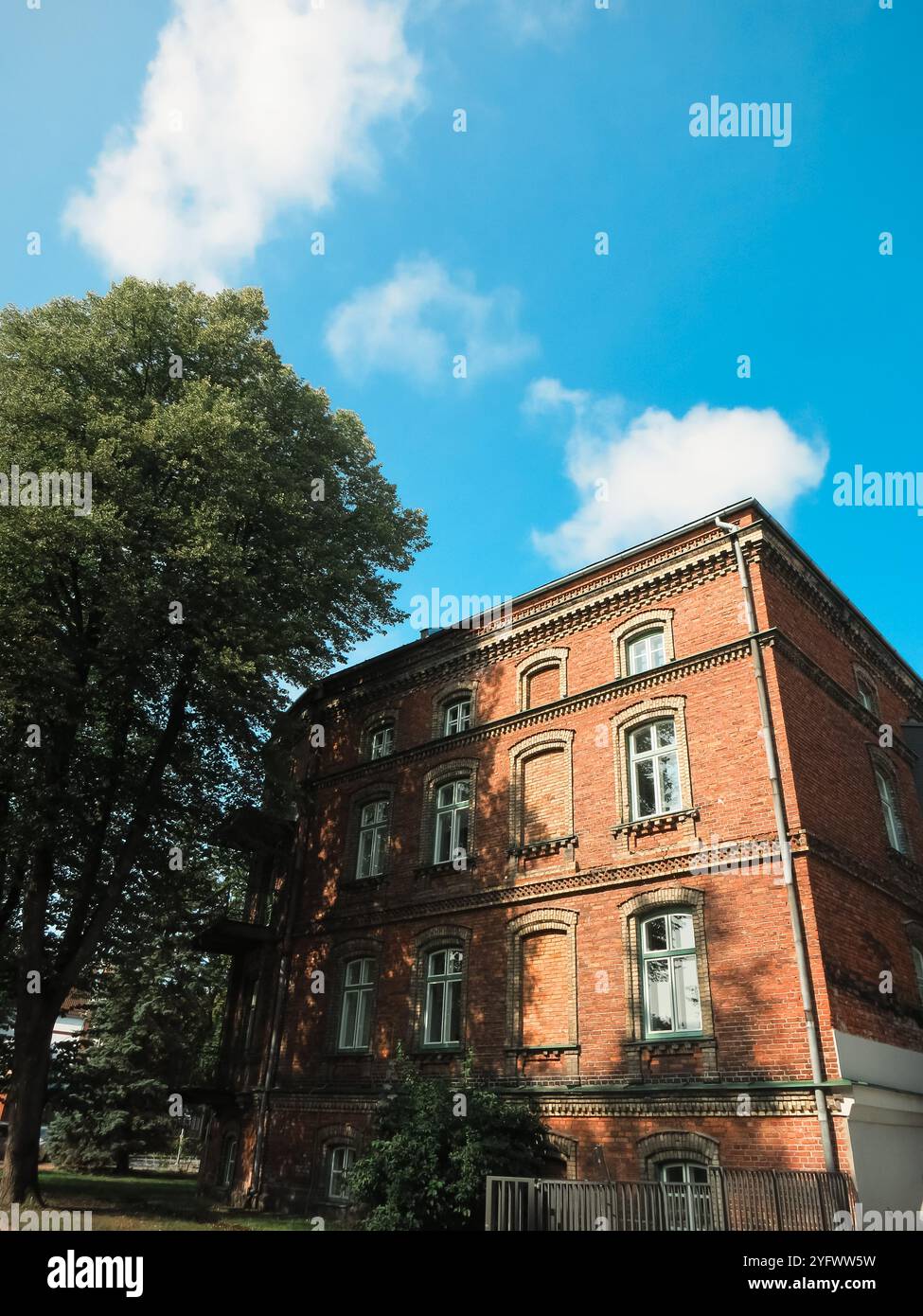 Old red brick house in vintage style Stock Photo - Alamy