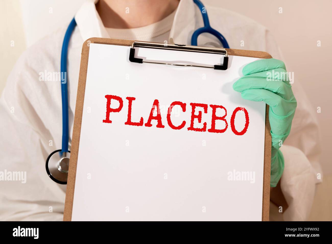 Female doctor showing medical paper with written text: Placebo Stock ...