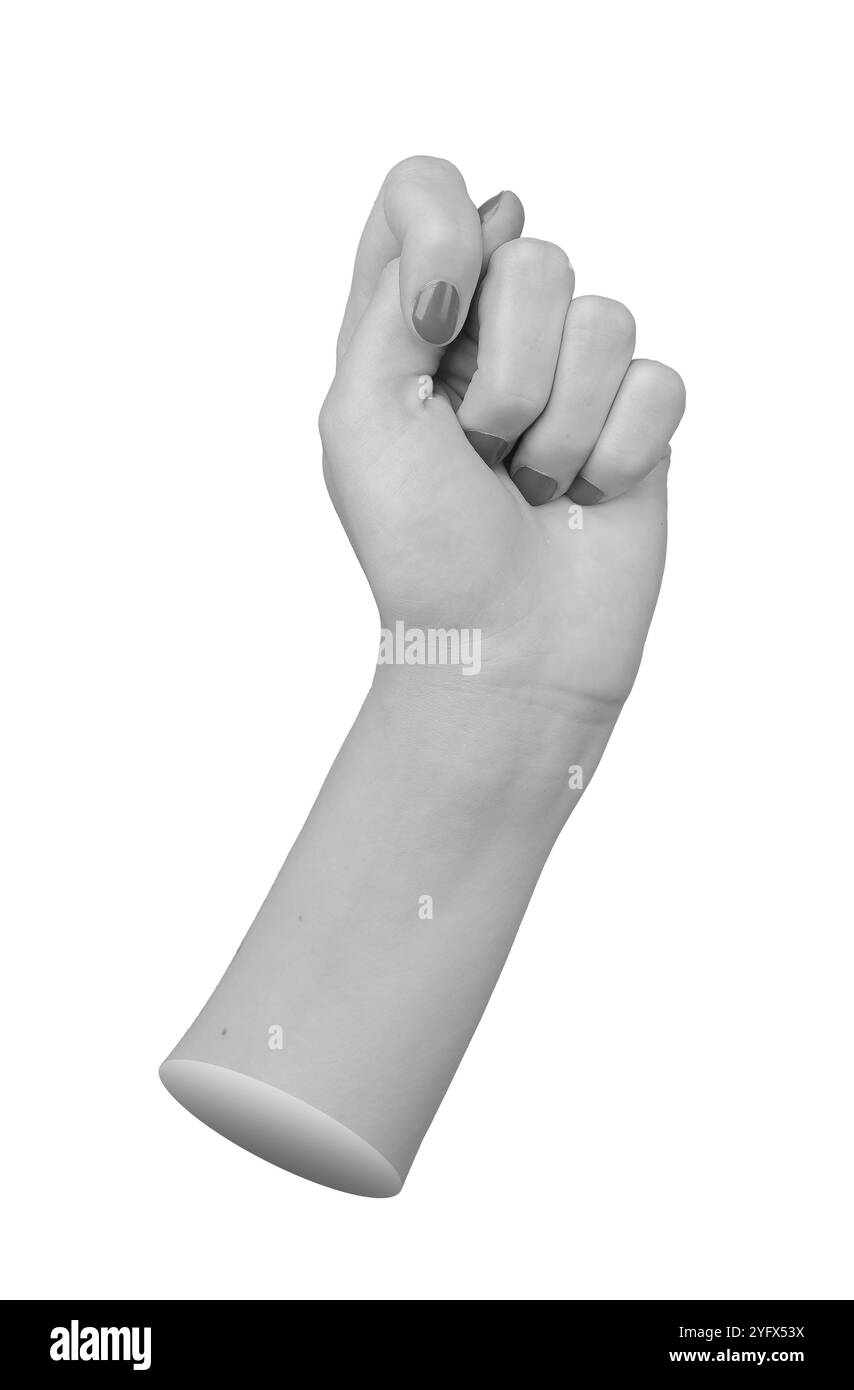 Female hand in a closed fist, thumb placed between index and middle ...