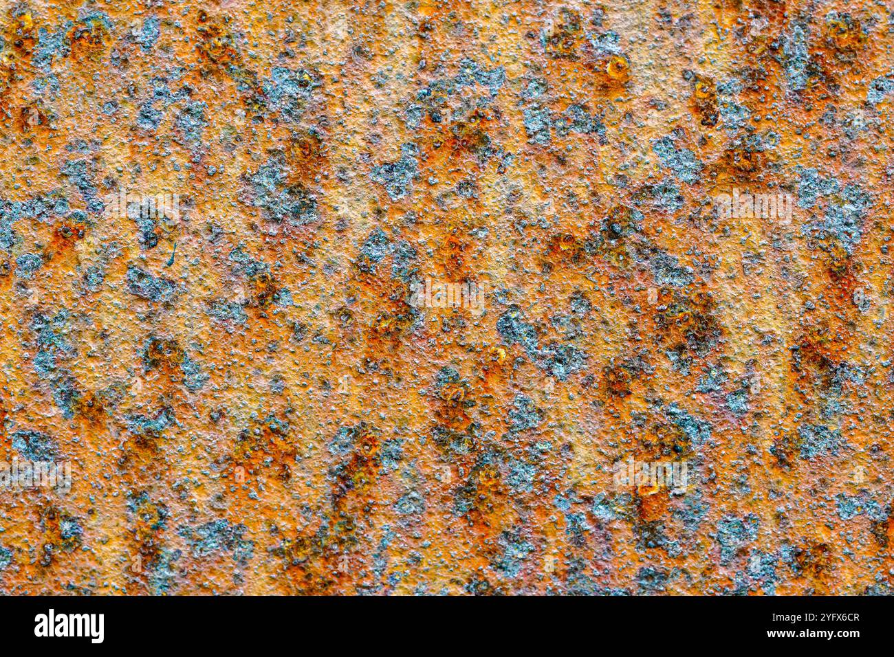 Metal surface covered with corrosion spots of different shades, rusted ...