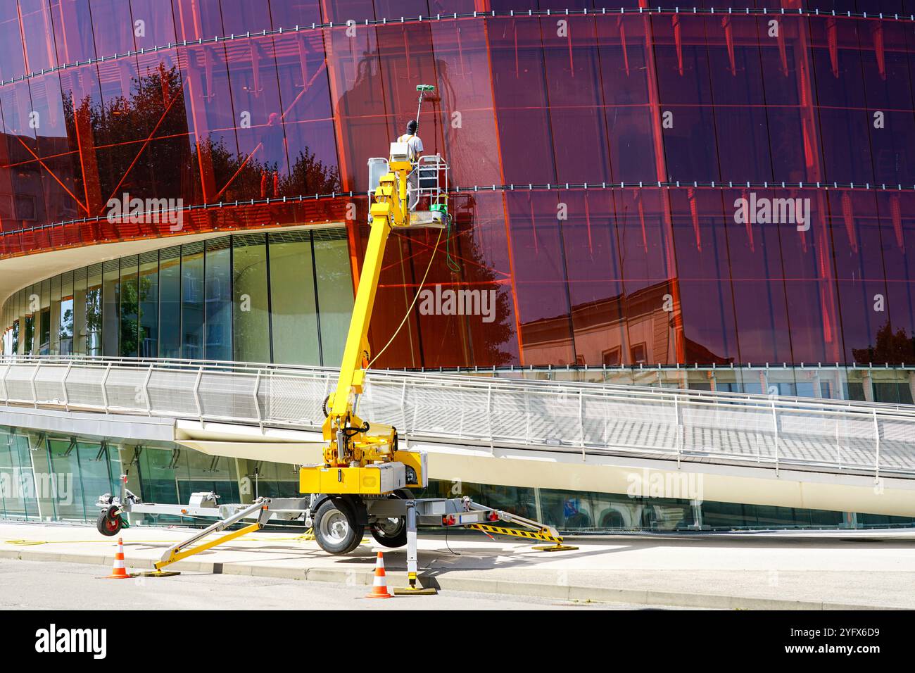 Glass facade cleaning works of a modern building using a modern ...