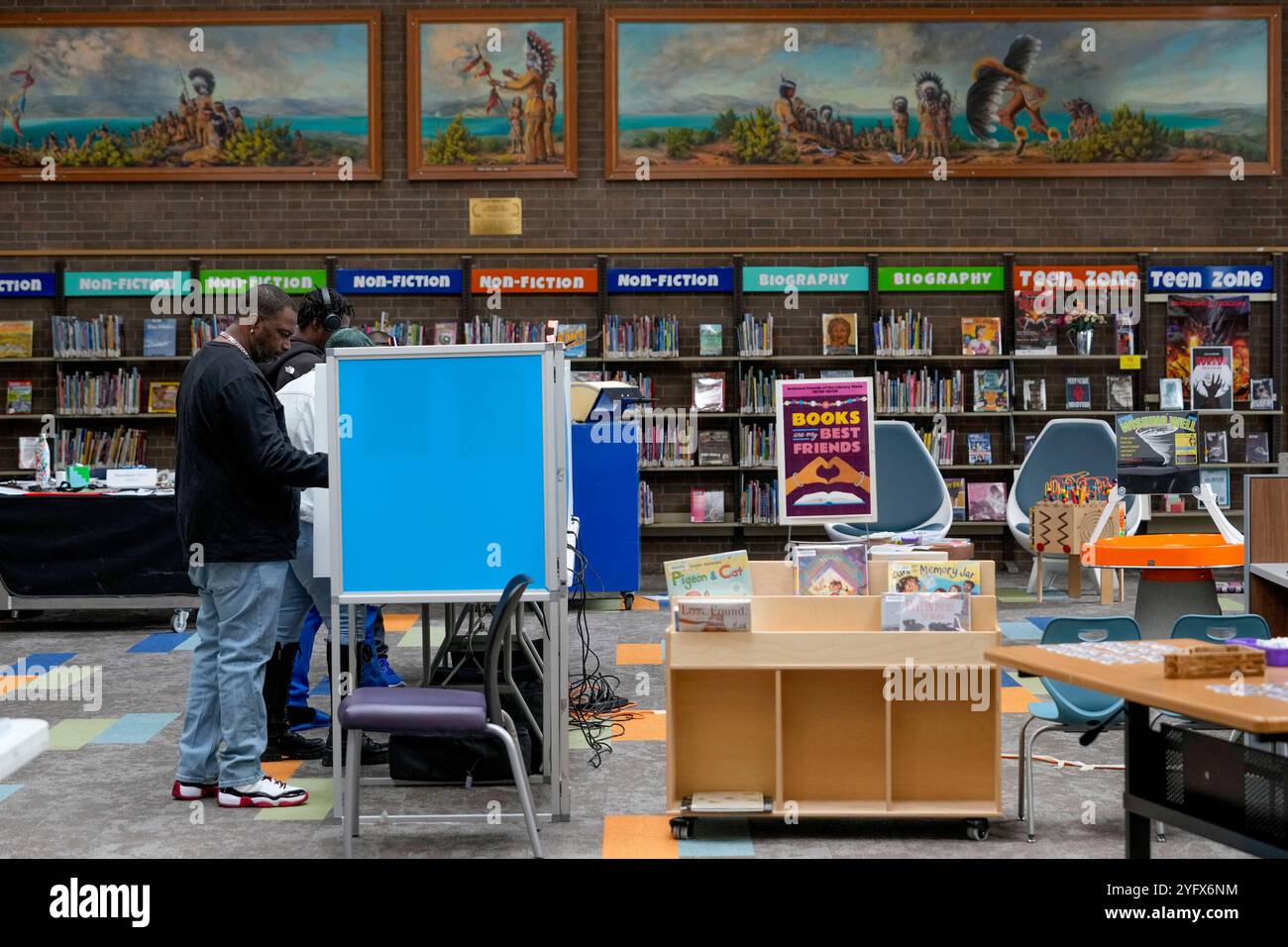 Voters cast their ballots at the Downtown Reno Library, Tuesday, Nov. 5 ...