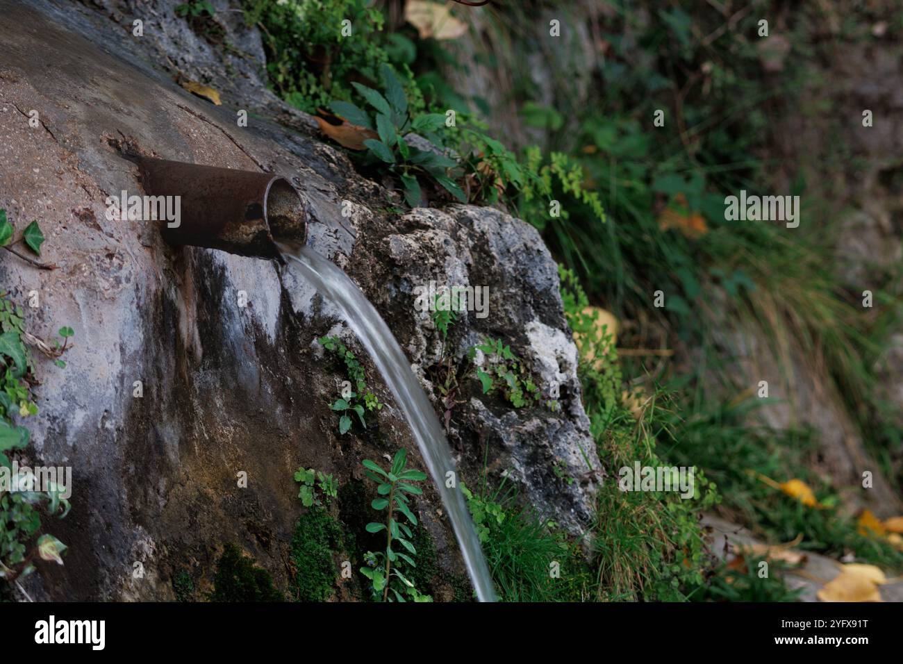 Water from fountain flows hi-res stock photography and images - Alamy