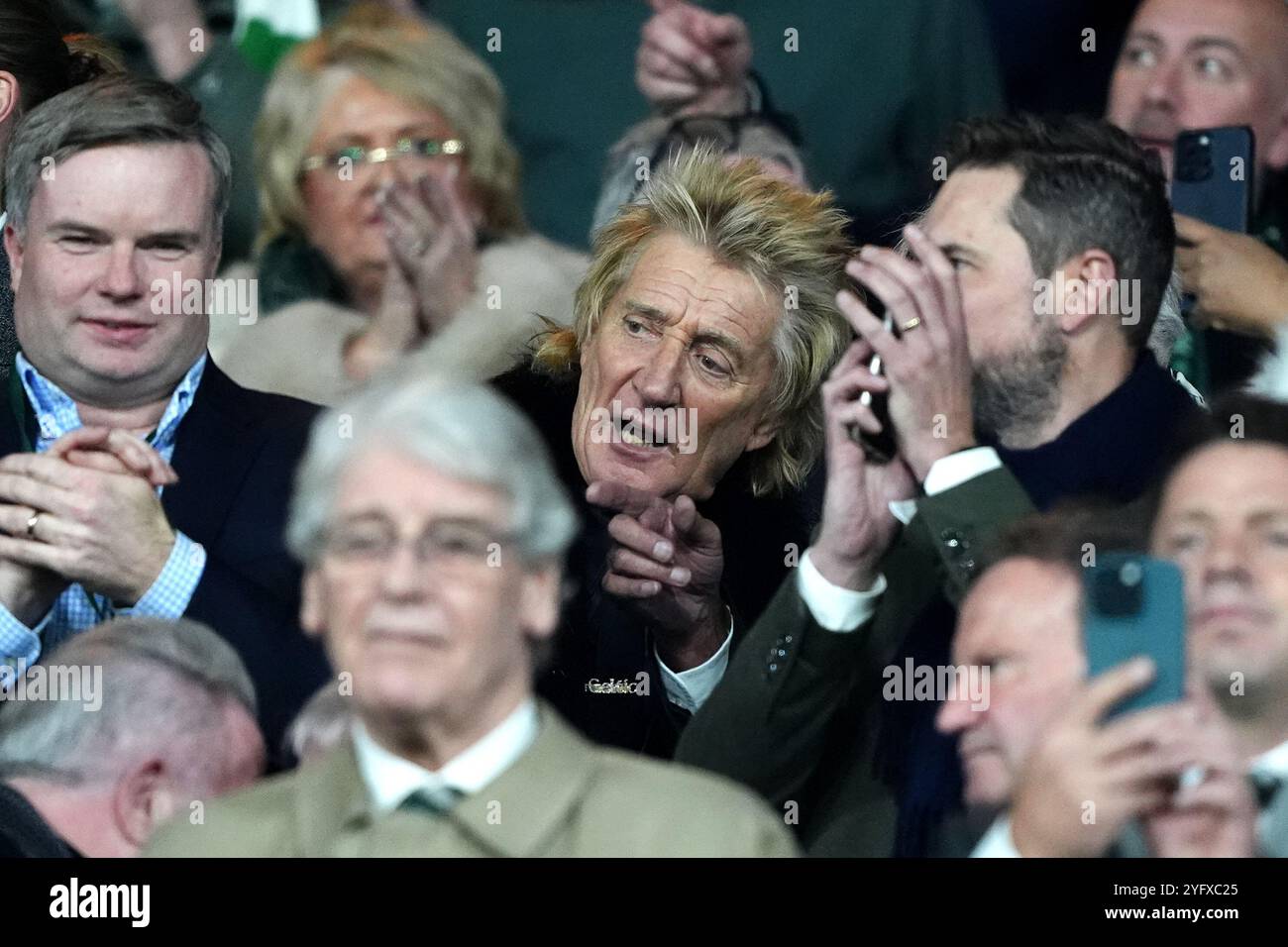 Singer Rod Stewart (centre) in the stand before the UEFA Champions ...
