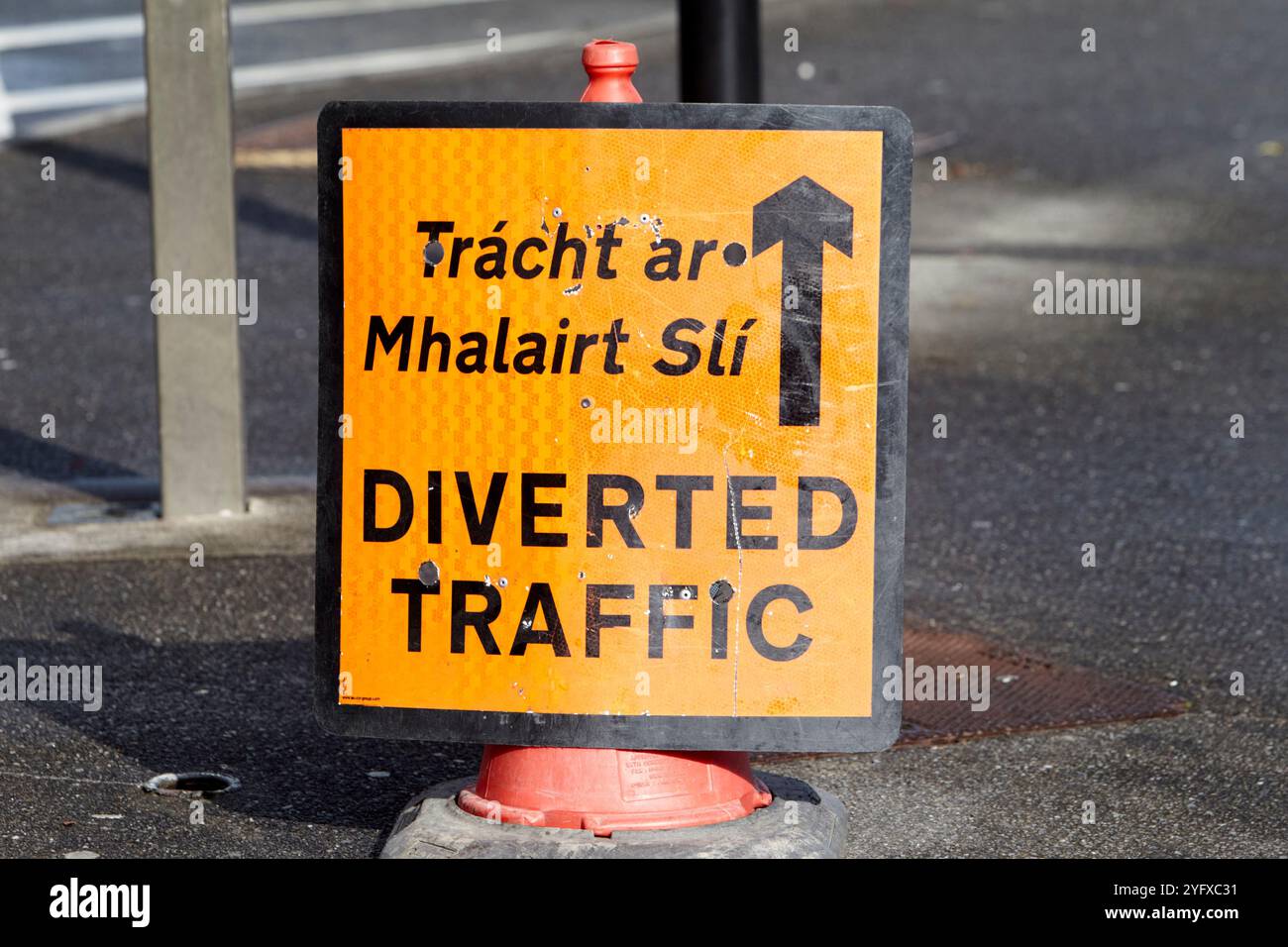 temporary orange square diverted traffic sign due to roadworks ...