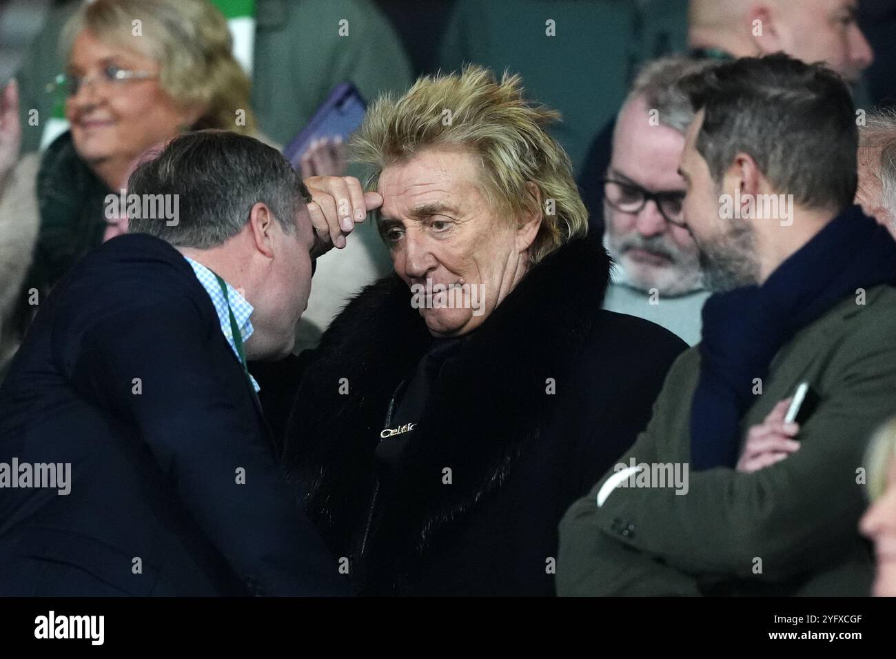 Singer Rod Stewart (centre) in the stand before the UEFA Champions ...
