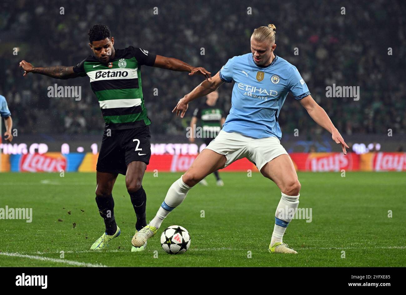 Manchester City's Erling Haaland and Sporting Lisbon's Matheus Reis ...