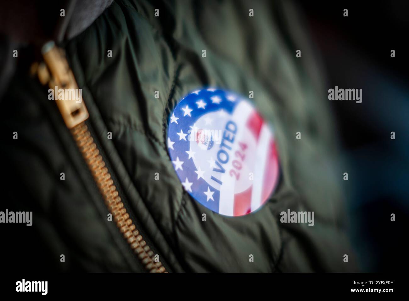 A voter wears her "I Voted" sticker on Election Day in New York on ...