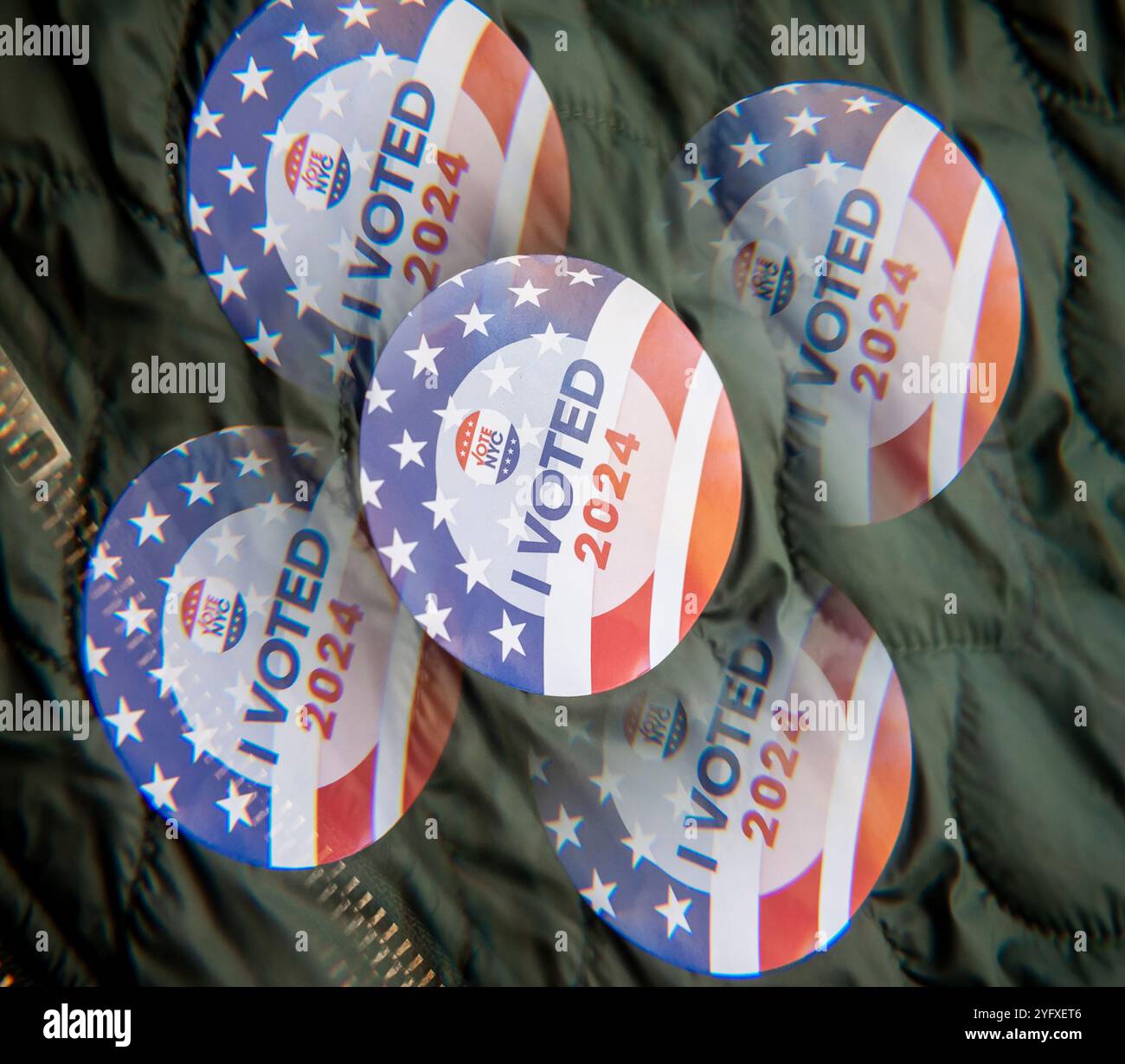 A voter wears her "I Voted" sticker on Election Day in New York on ...