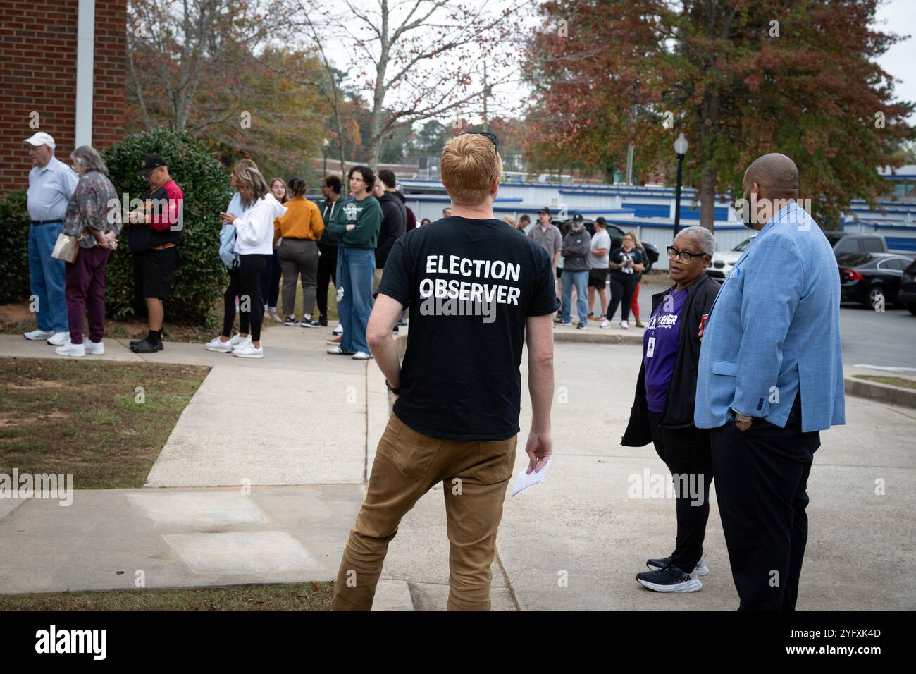 Woodstock, Georgia, USA. 5th Nov, 2024. An election observer from the ...