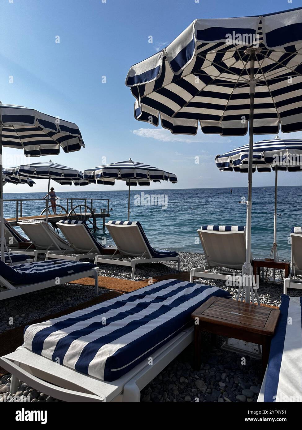 sun beds at a beach bar in Nice, South of France Stock Photo - Alamy