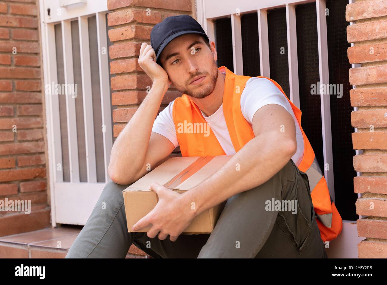 Discouraged parcel delivery man can't find the address to deliver the ...