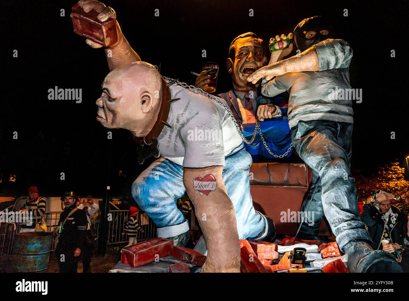 Lewes, UK. 5th Nov, 2024. Cliffe Bonfire Society parade an Effigy of ...