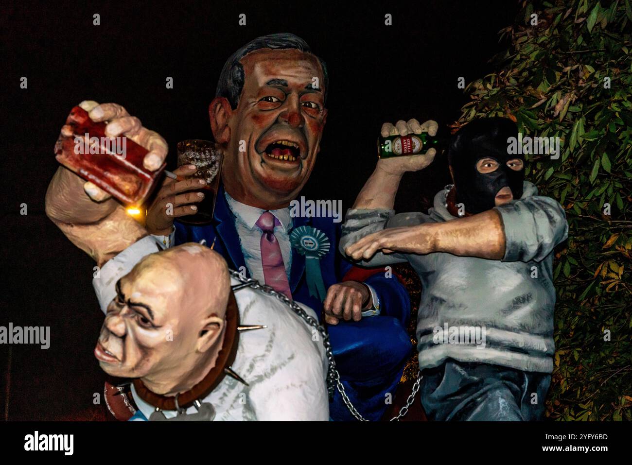 Lewes, UK. 5th Nov, 2024. Cliffe Bonfire Society parade an Effigy of ...