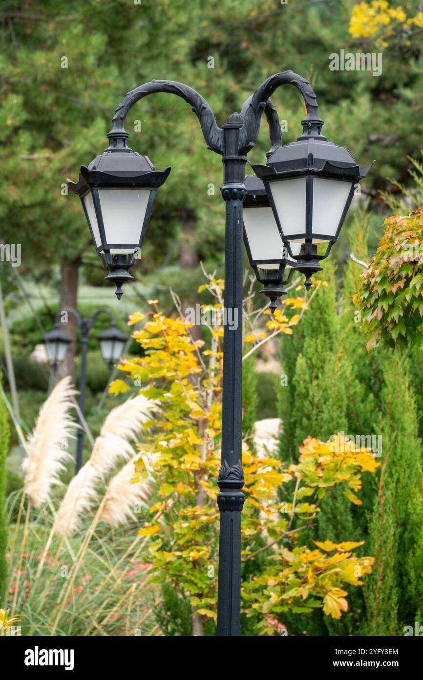 Lamps Garden Lighting Outdoor - Three black lamp posts with white glass ...