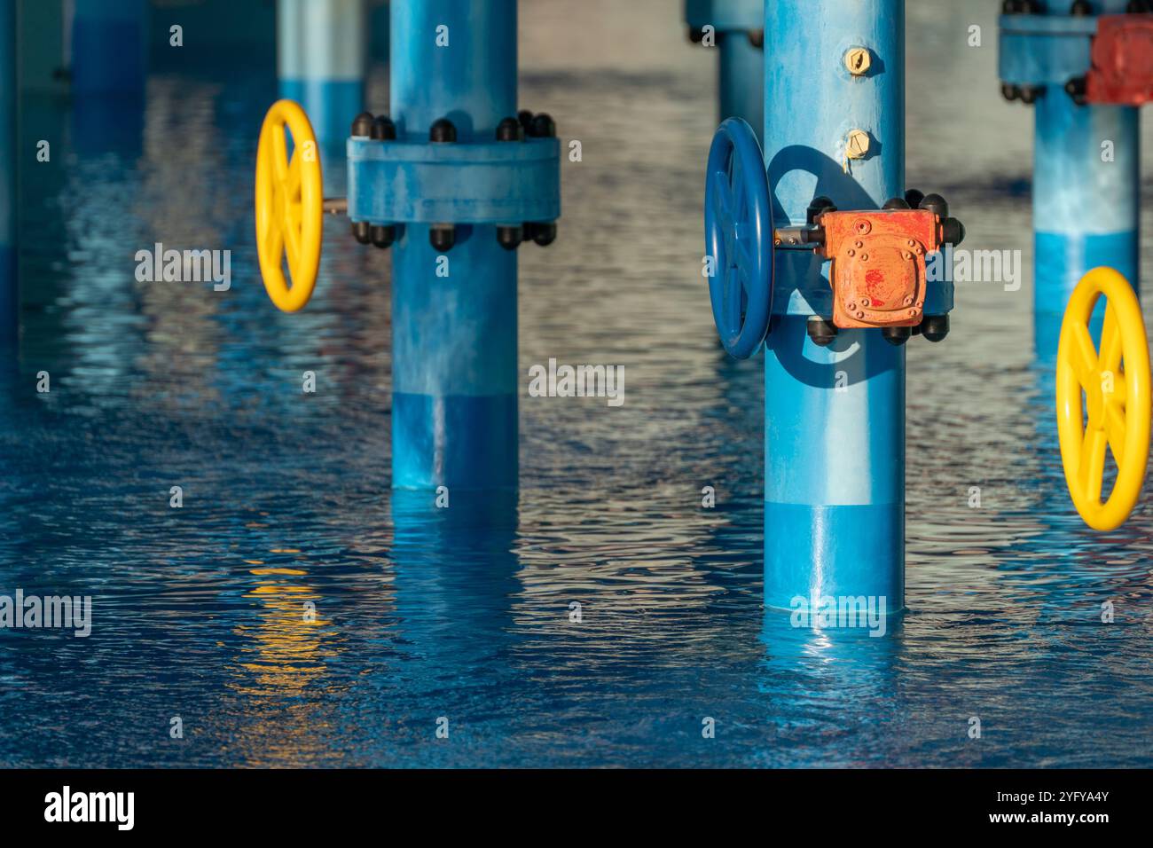 Pipes Valves Water - Industrial facility showing blue pipes with valves ...