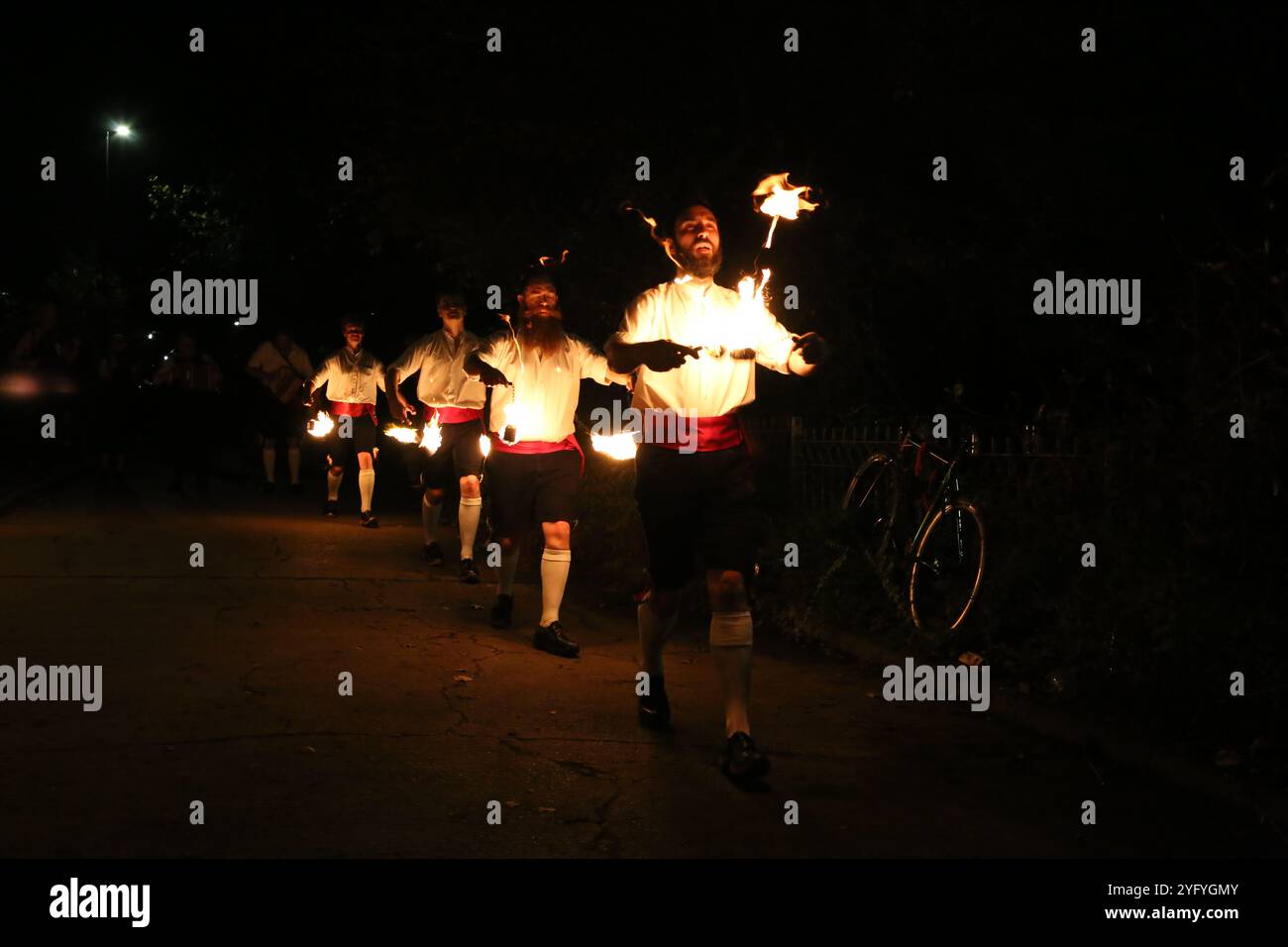 Dancing kingsmen rapper and clog fire dance hi-res stock photography ...