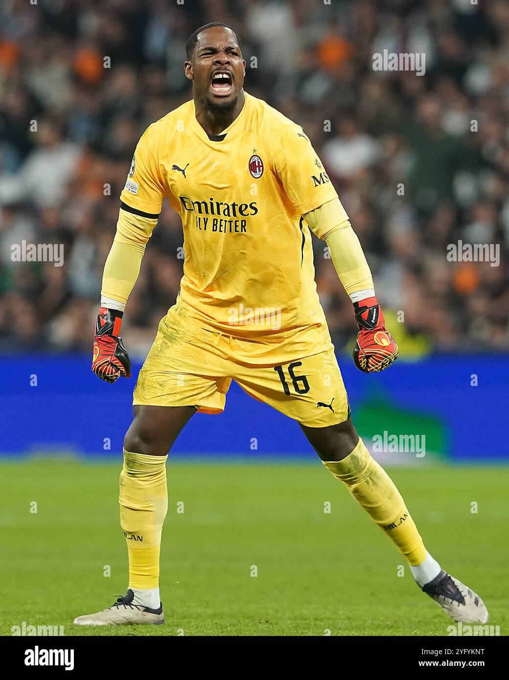 AC Milan's Mike Maignan celebrates goal during Champions League 2024/ ...