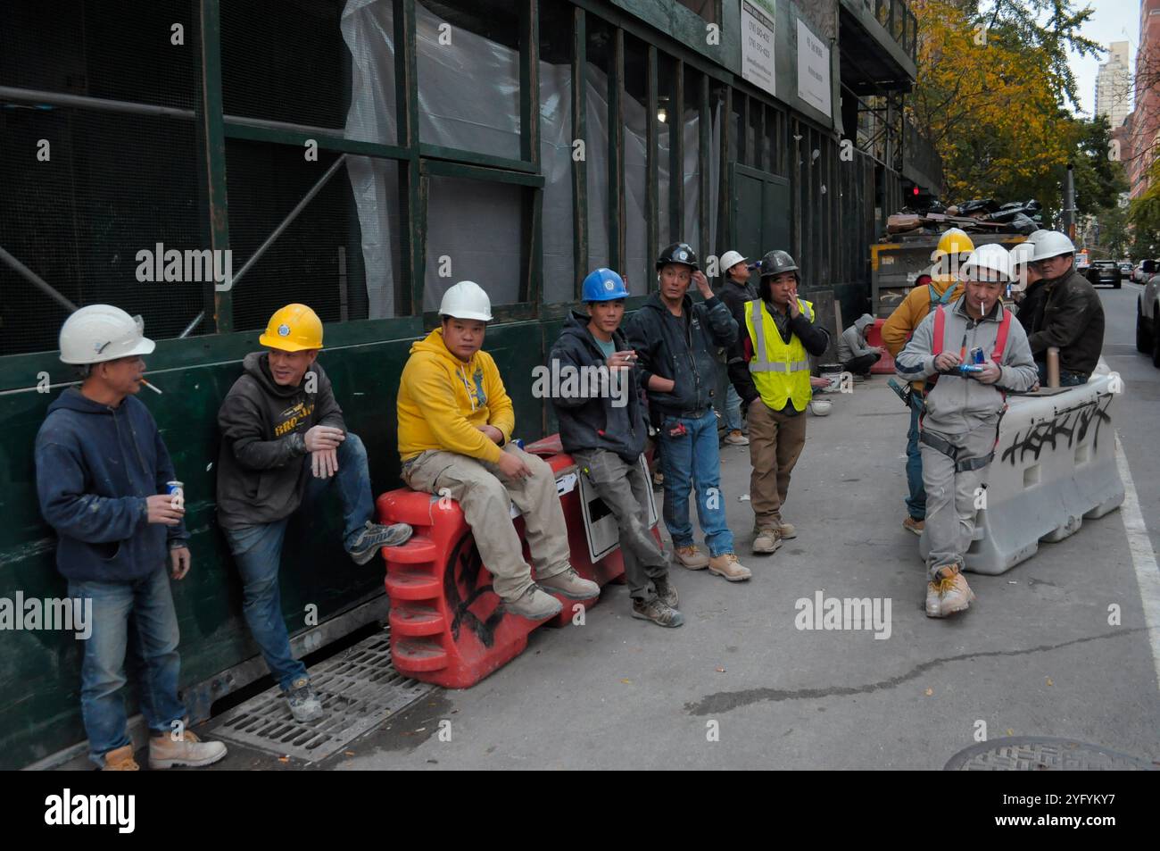Construction workers are seen on the street in Manhattan, New York City ...