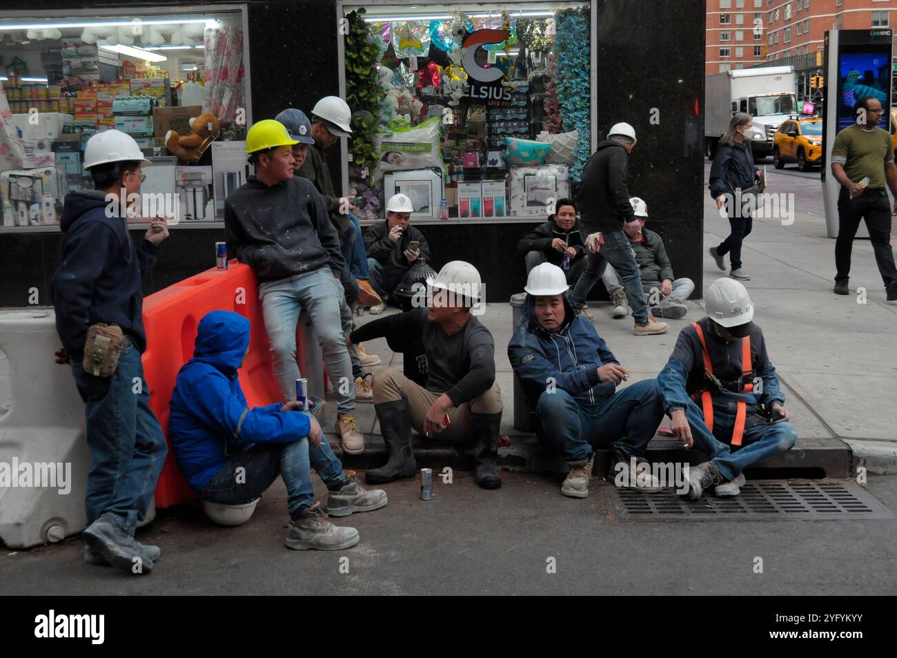 Construction workers are seen on the street in Manhattan, New York City ...