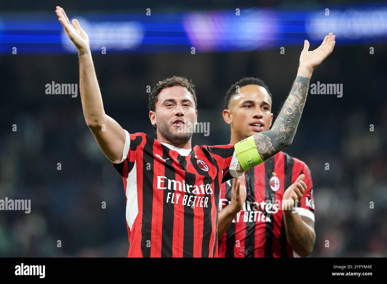 AC Milan's Davide Calabria (l) and Noah Okafor celebrate the victory in ...