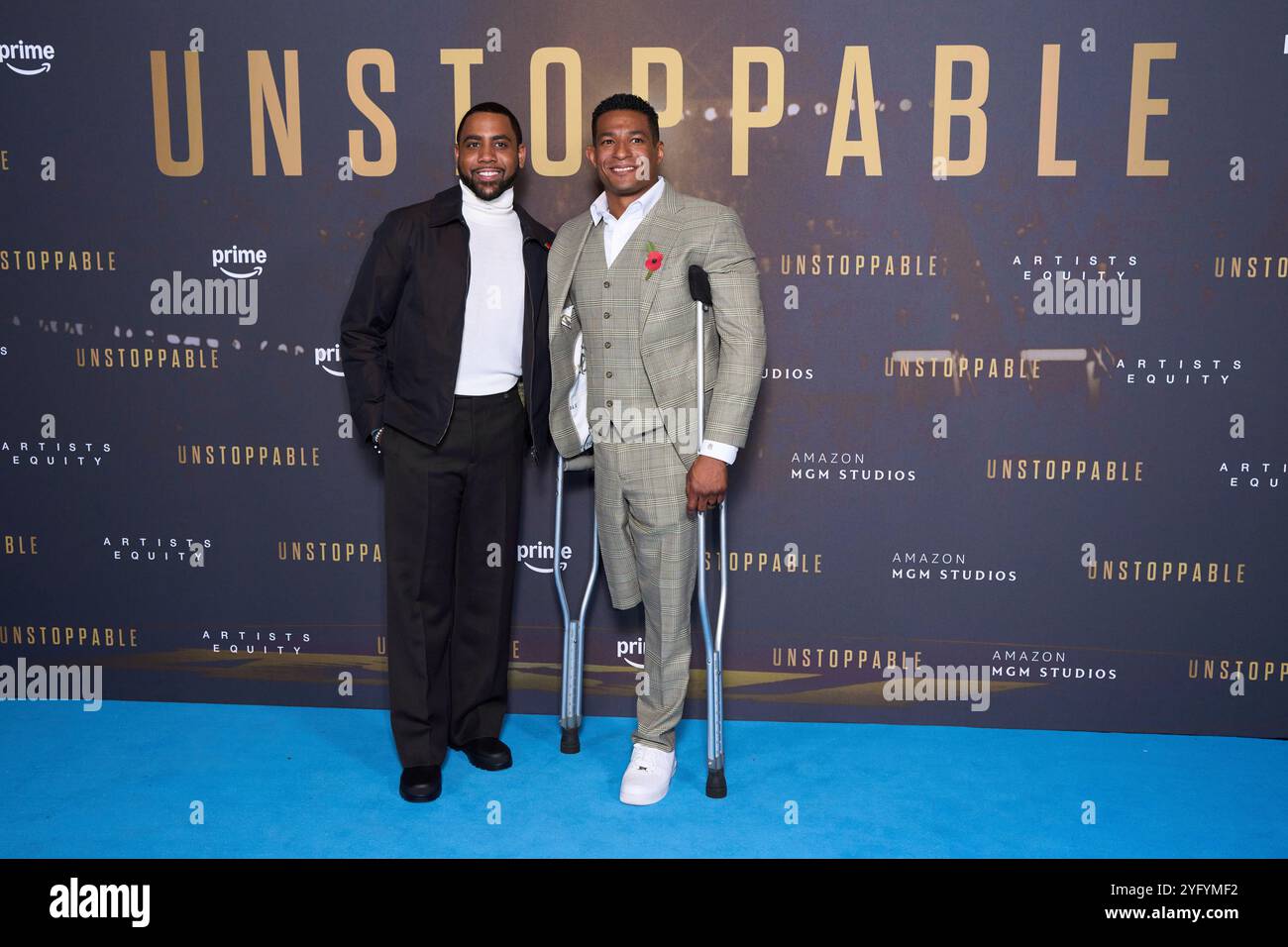 Jharrel Jerome, left, and Anthony Robles pose for photographers upon ...
