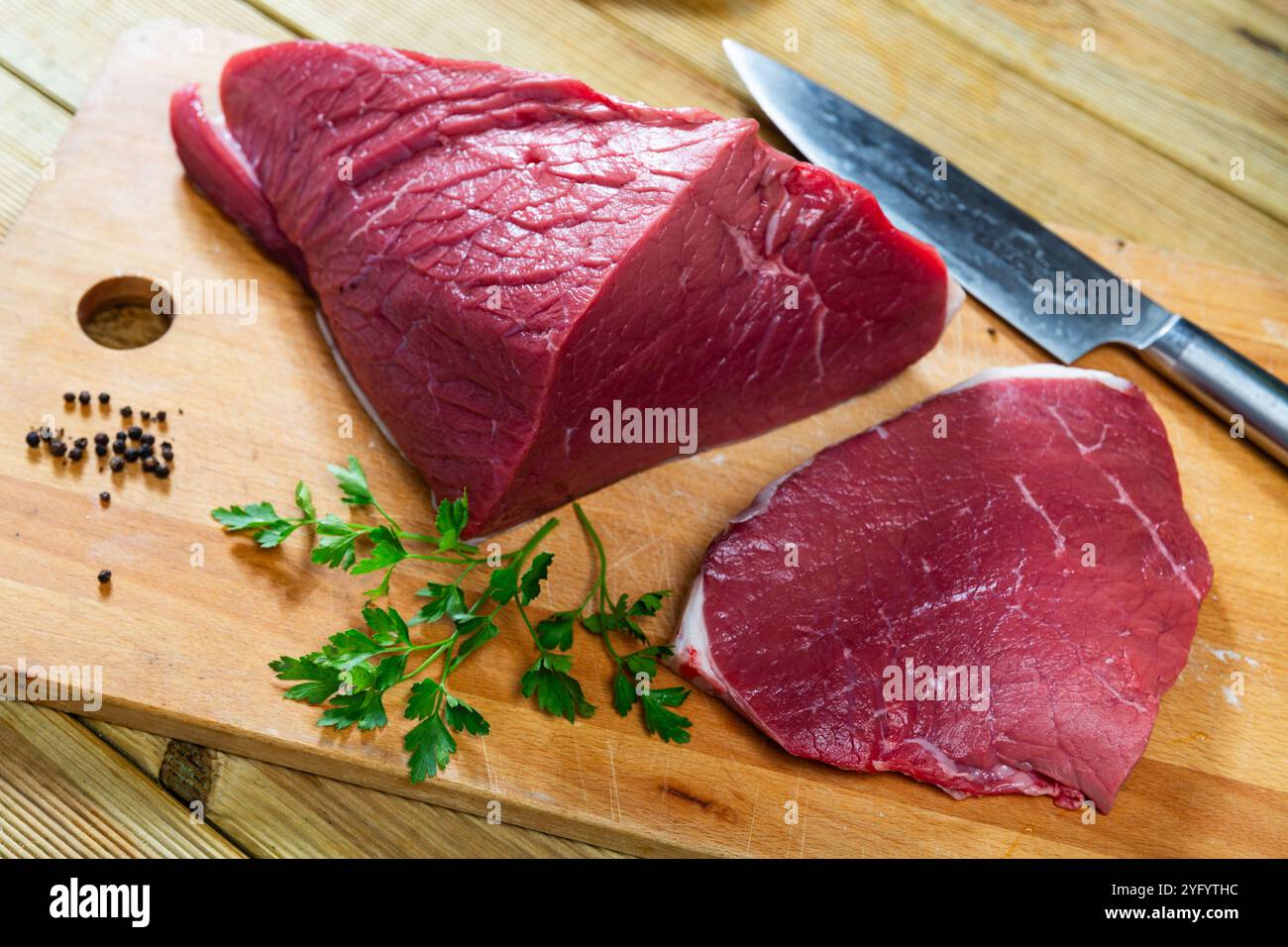 Pieces of raw thick beef steaks Stock Photo - Alamy