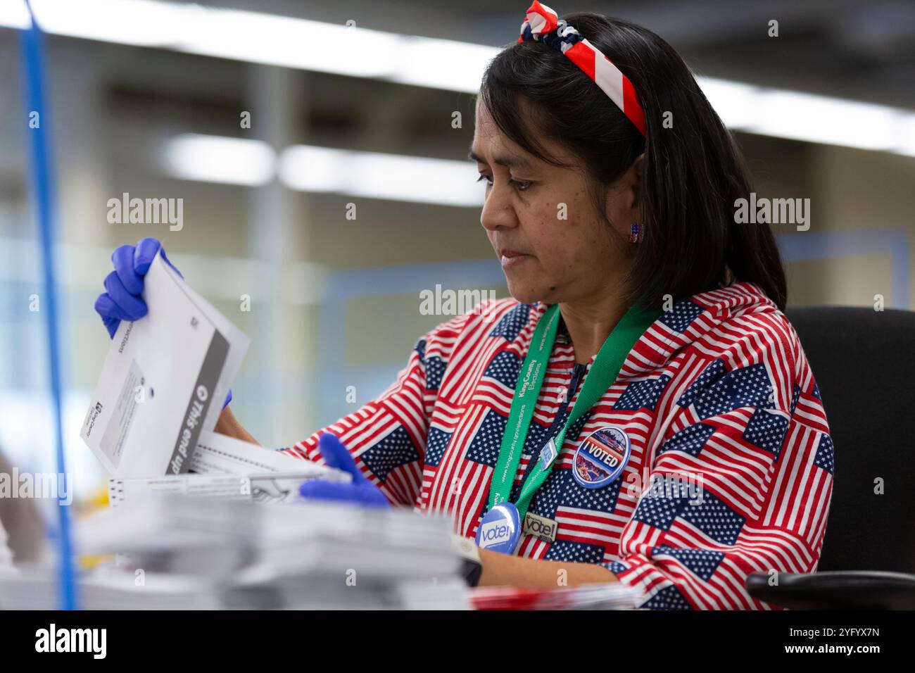 Renton, Washington, USA. 5th November, 2024. A temporary lection worker ...