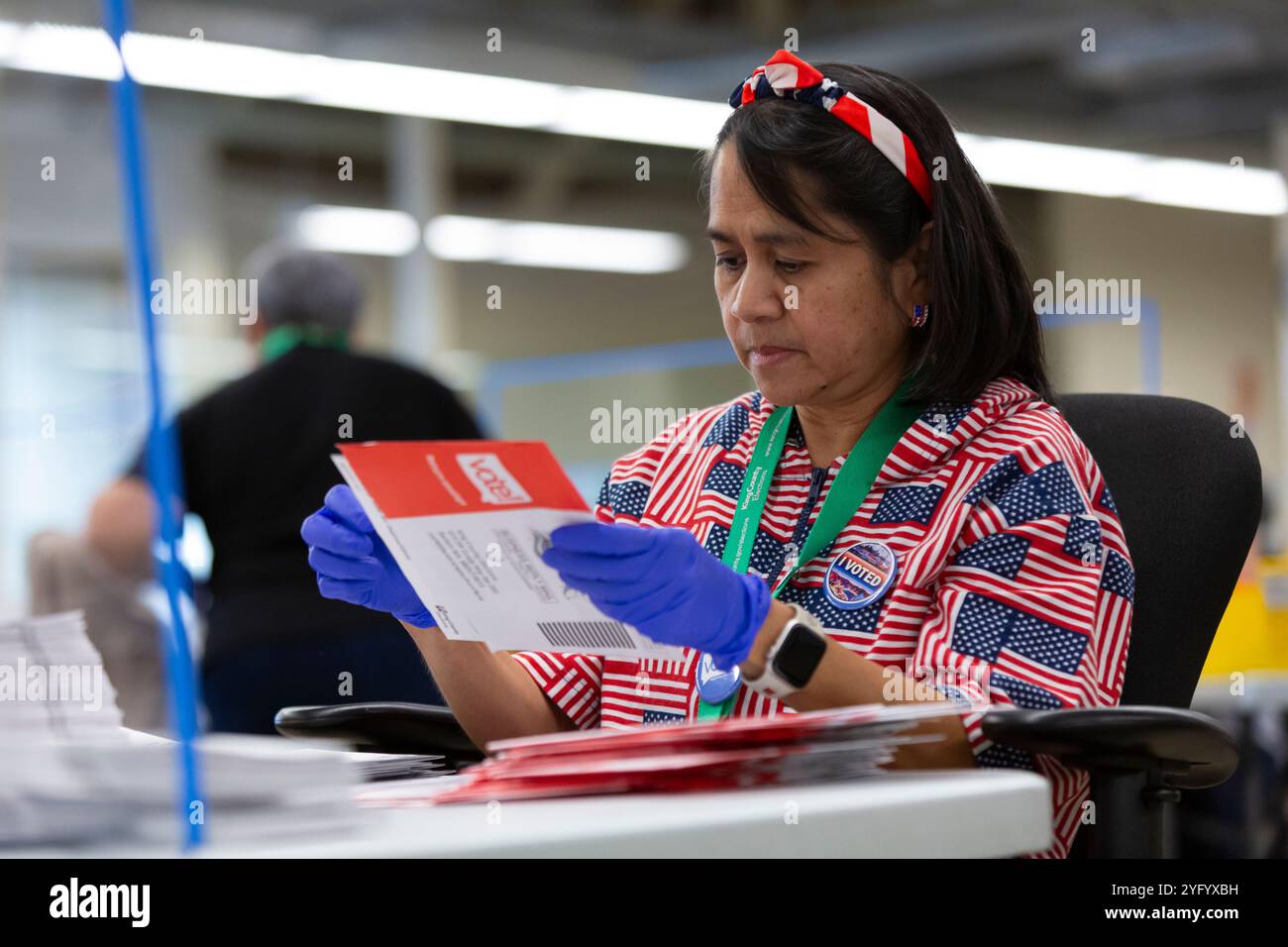 Renton, Washington, USA. 5th November, 2024. A temporary lection worker ...