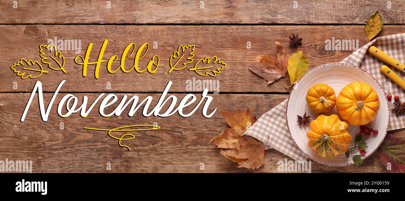 Banner with text HELLO NOVEMBER with pumpkins and stylish table setting ...