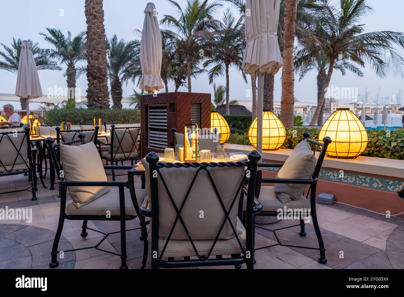 Table setting for dunner at the Shore restaurant in the gardens of the ...