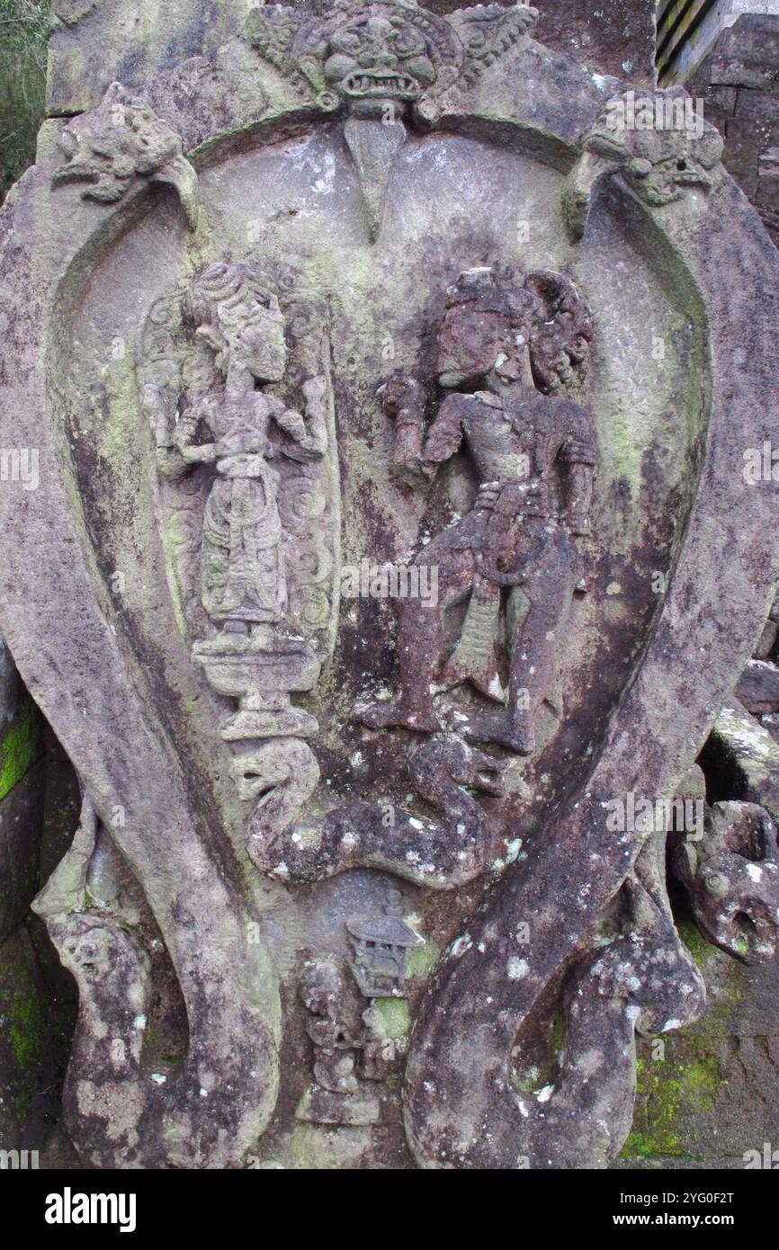 Bas-relief sculptures on wall at encased foot of Sukuh Temple, ancient ...